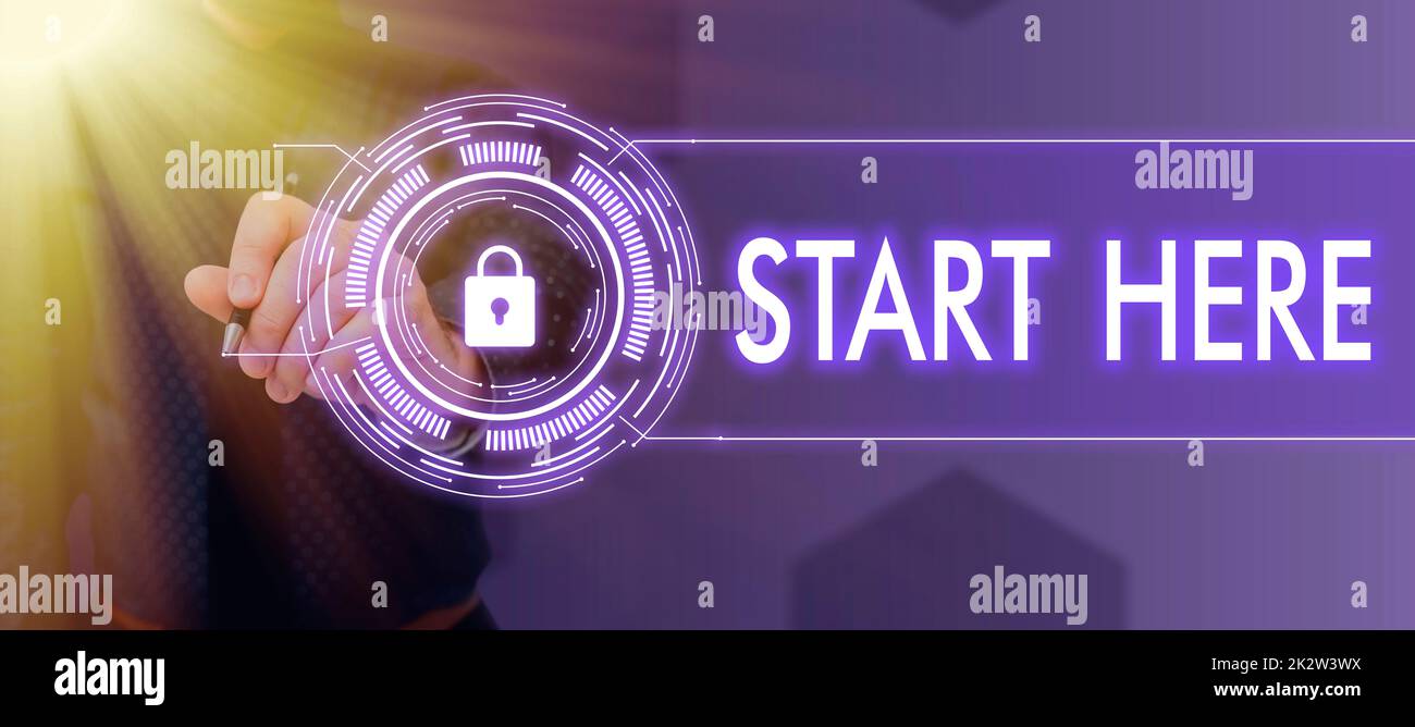 Sign displaying Start Here. Word Written on telling someone this is ...