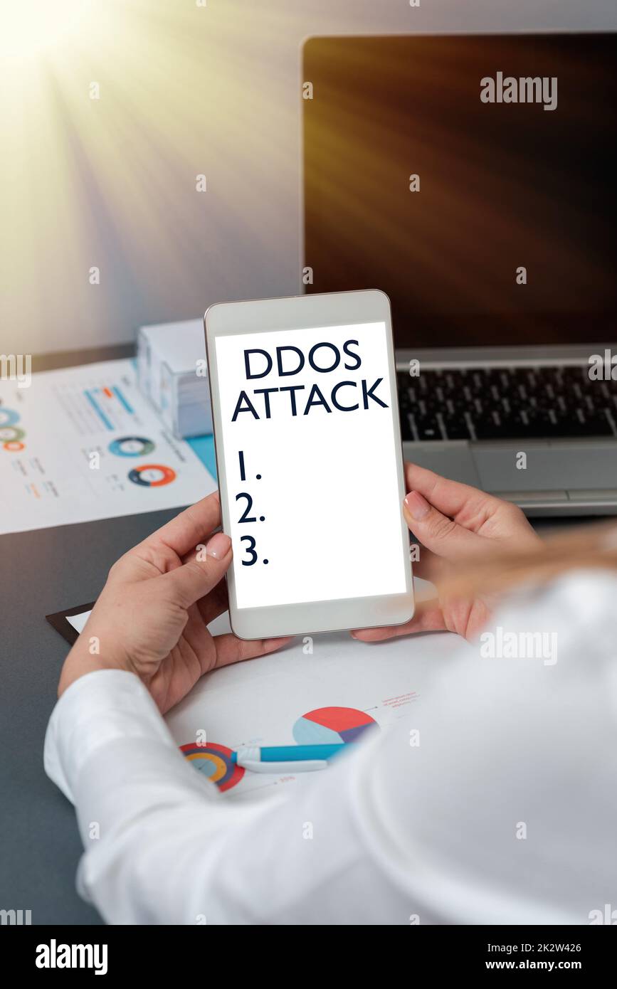 Hand writing sign Ddos Attack. Internet Concept perpetrator seeks to ...