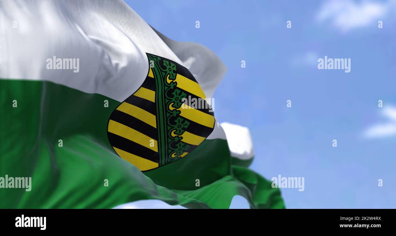 The flag of Saxony waving in the wind on a clear day Stock Photo - Alamy