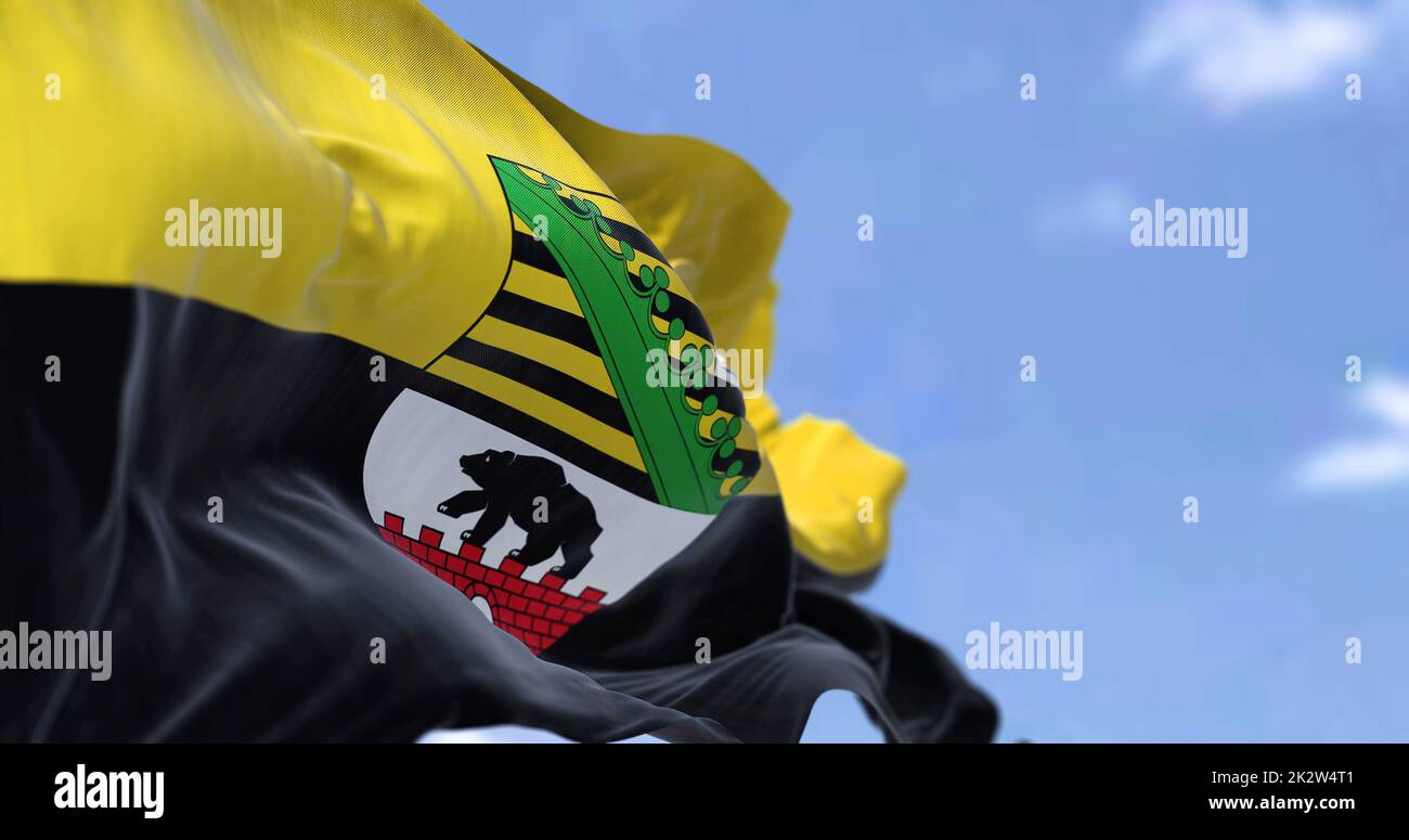 The flag of Saxony-Anhalt waving in the wind on a clear day Stock Photo ...