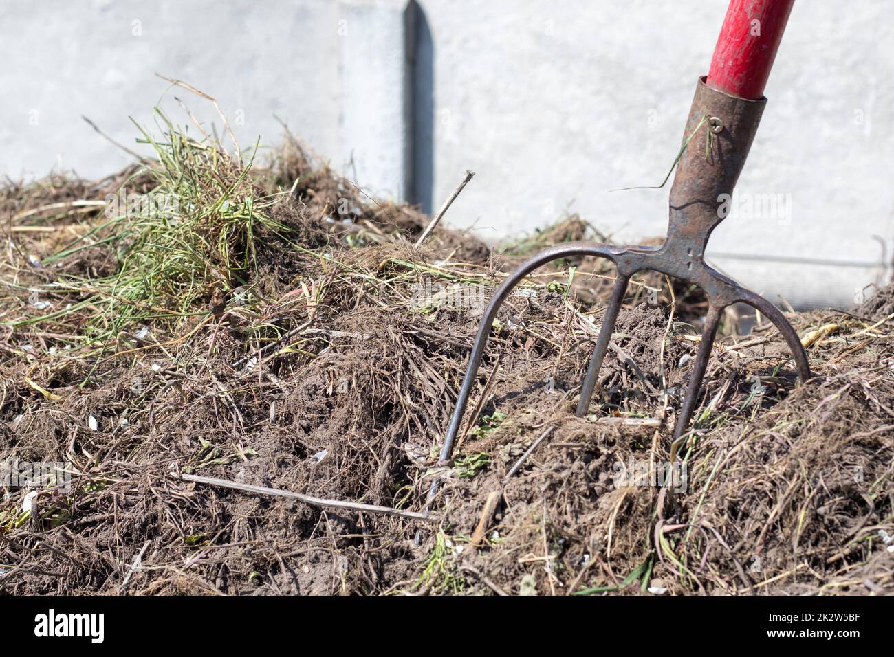 Fork with red handle for composting, recycling lawn and garden waste ...