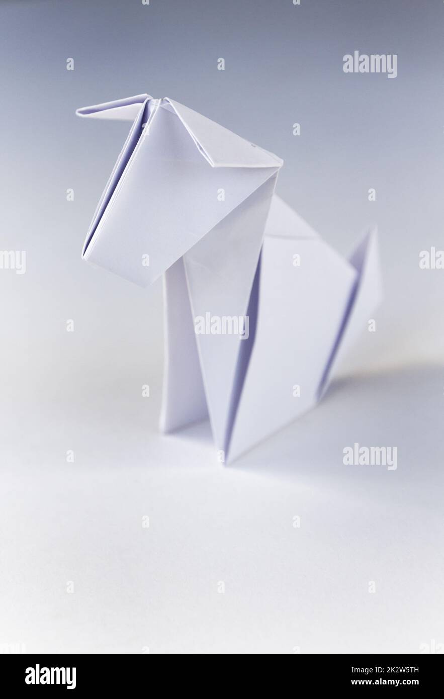 Paper dog origami isolated on a white background Stock Photo - Alamy