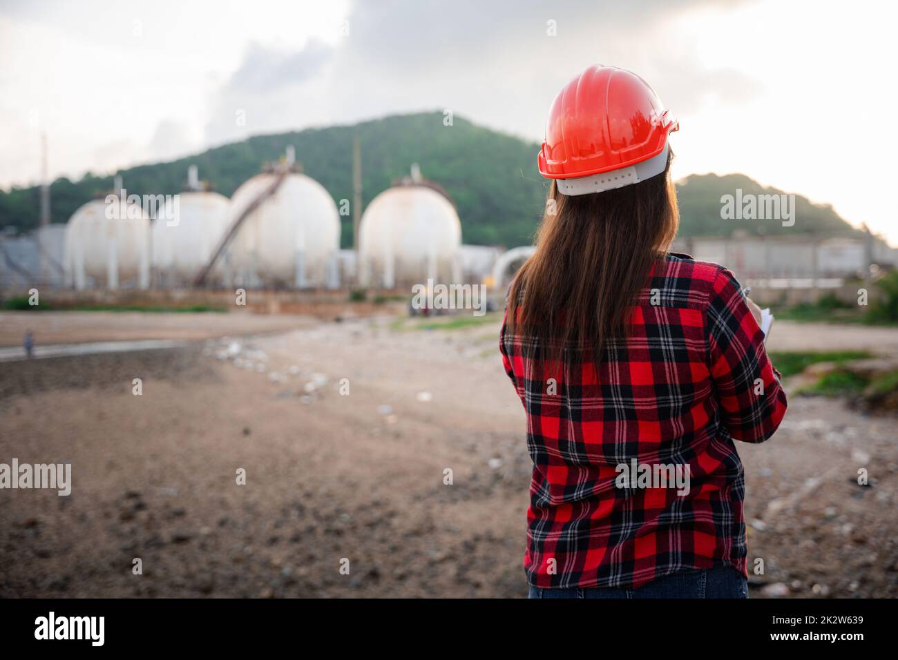 Happy Asian worker woman in oil chemical industry worker working visual ...
