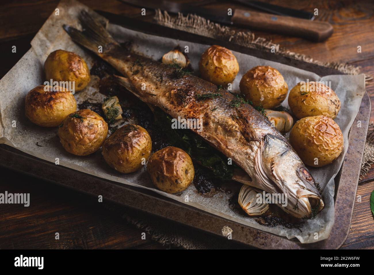 Baked seabass fish hi-res stock photography and images - Alamy