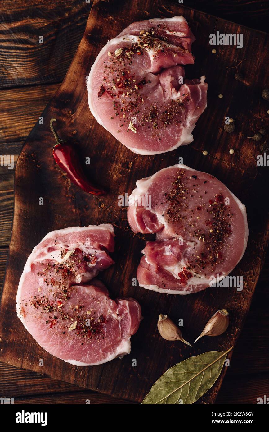 Raw pork steaks spices hi-res stock photography and images - Alamy