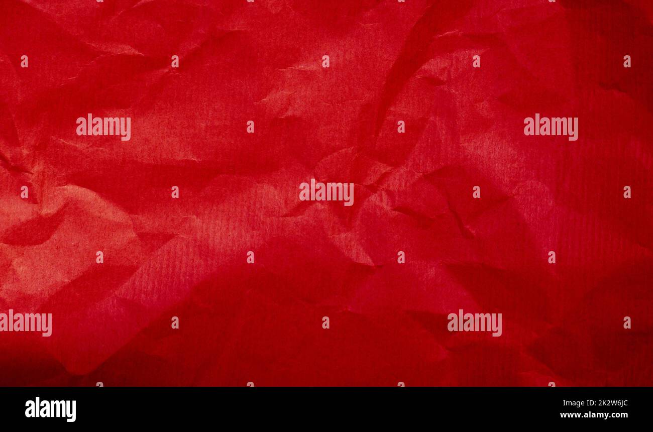 Crumbled paper background with red color Stock Photo - Alamy