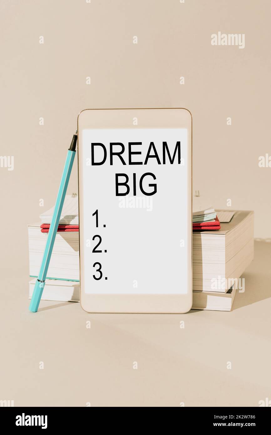 Text sign showing Dream Big. Business showcase To think of something ...