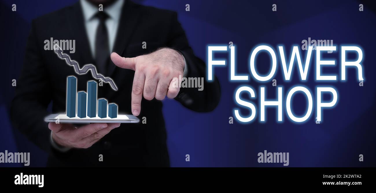 Sign displaying Flower Shop. Word Written on where cut flowers are sold ...