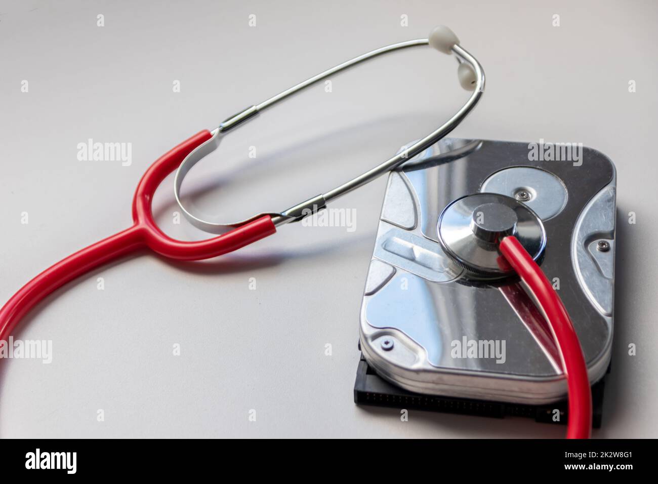Red stethoscope with internal hard disk drive hdd contains health ...