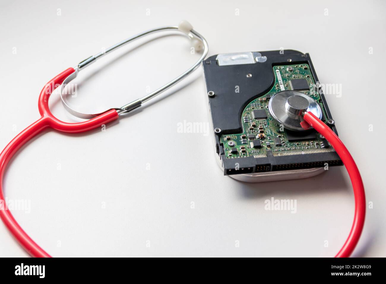 Red stethoscope with internal hard disk drive hdd contains health ...