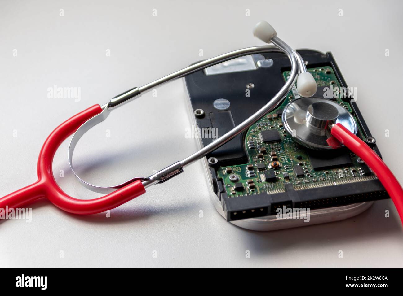 Red stethoscope with internal hard disk drive hdd contains health ...