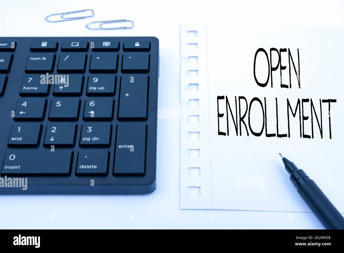 Text caption presenting Open Enrollment. Business approach The yearly ...