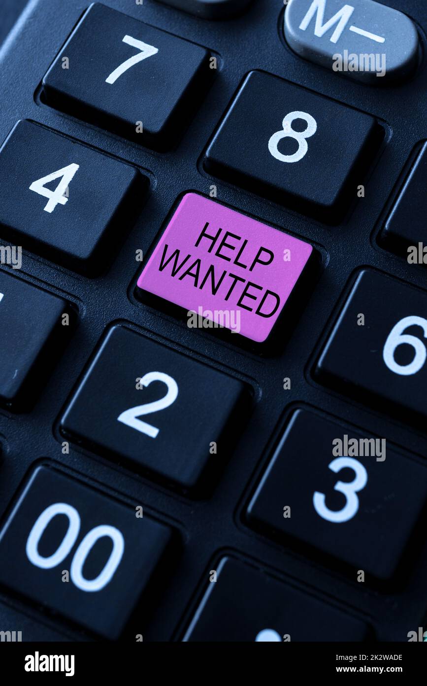 Hand writing sign Help Wanted. Business concept advertisement placed in ...