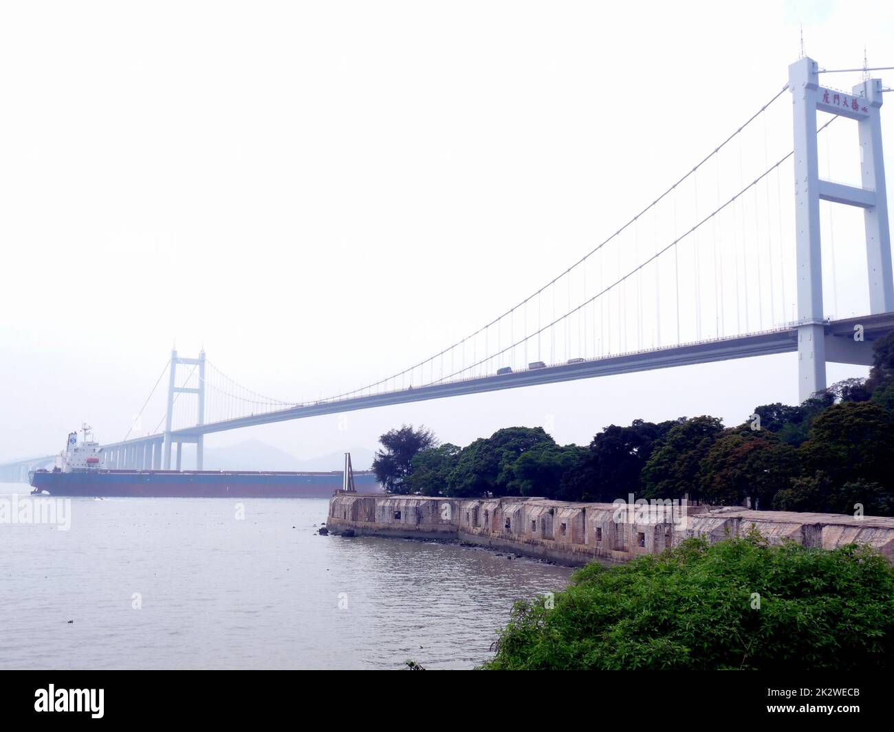 A low-angle shot of Weiyuan fort and Humen Bridge in Dongguan, China ...