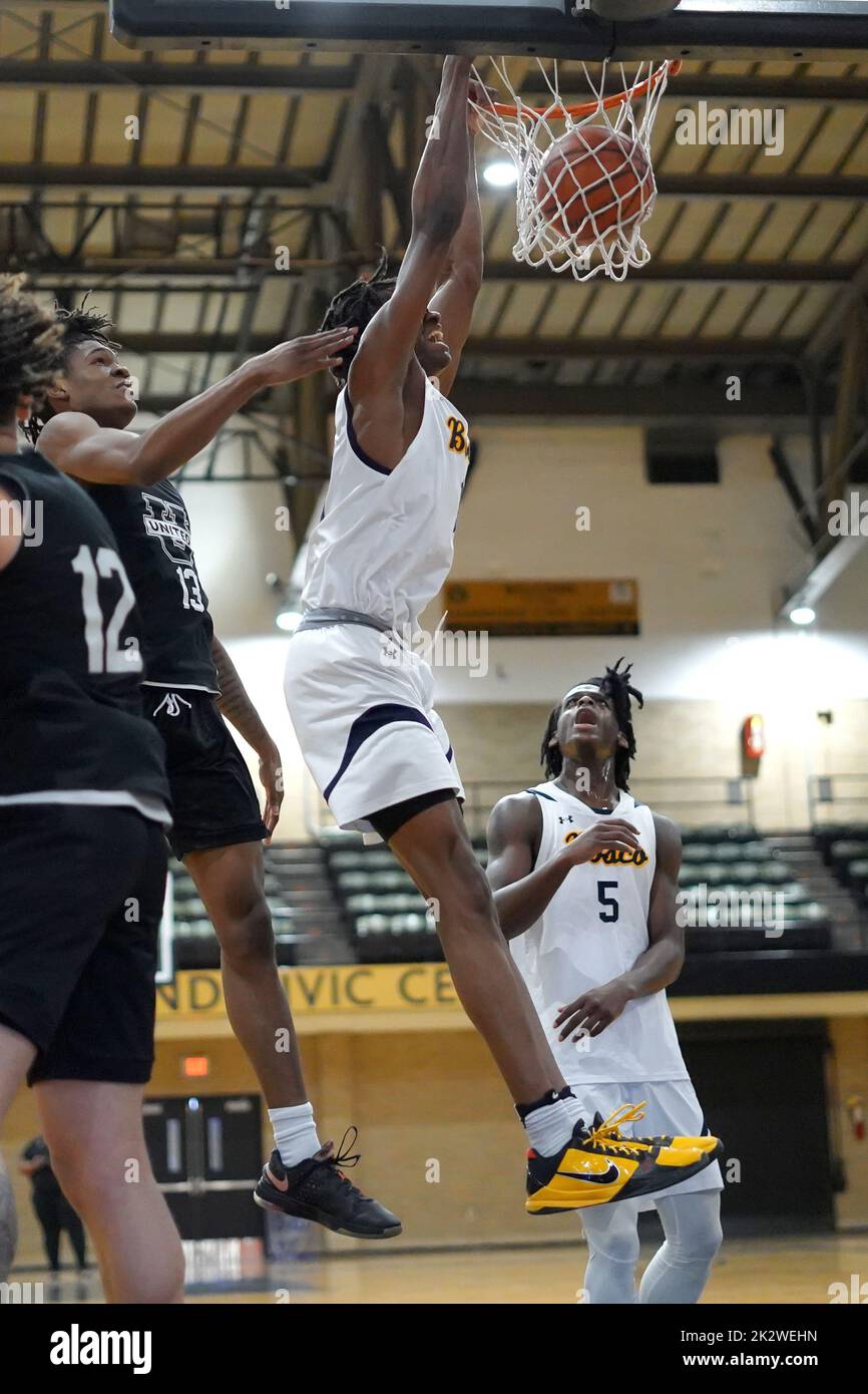 A vertical of African Americans playing basketball at Bosco vs United ...
