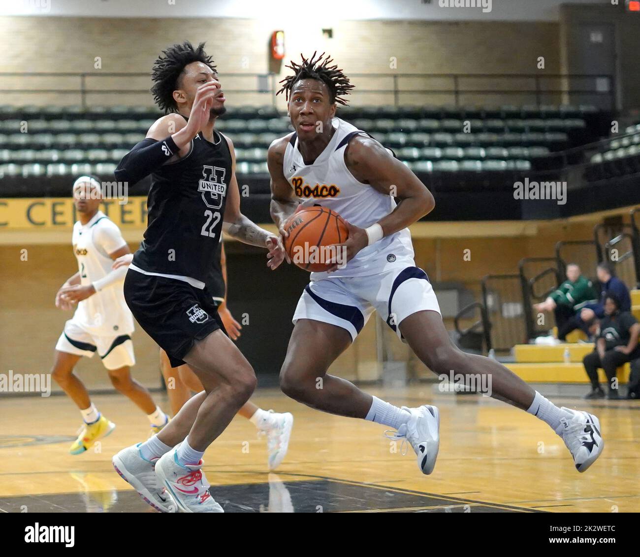 The African Americans playing basketball at Bosco vs United Prep game ...