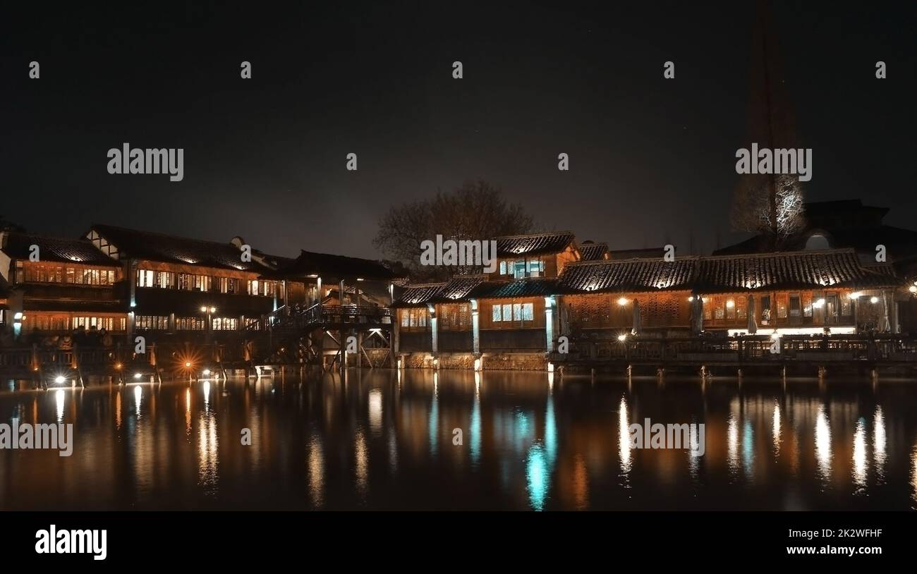 A scenic view of a Chinese village at night Stock Photo - Alamy