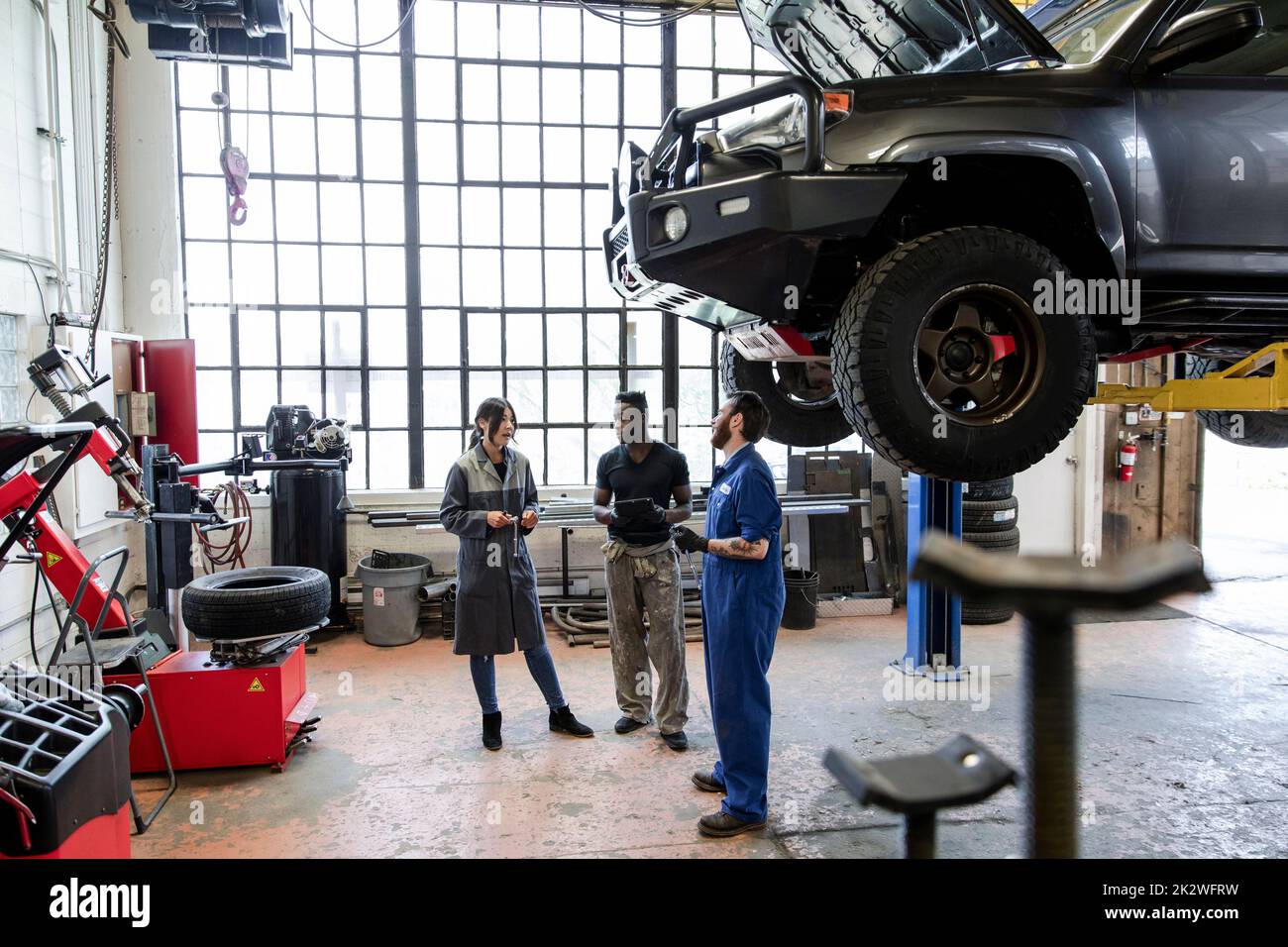 Business people meeting in a lift hi-res stock photography and images ...