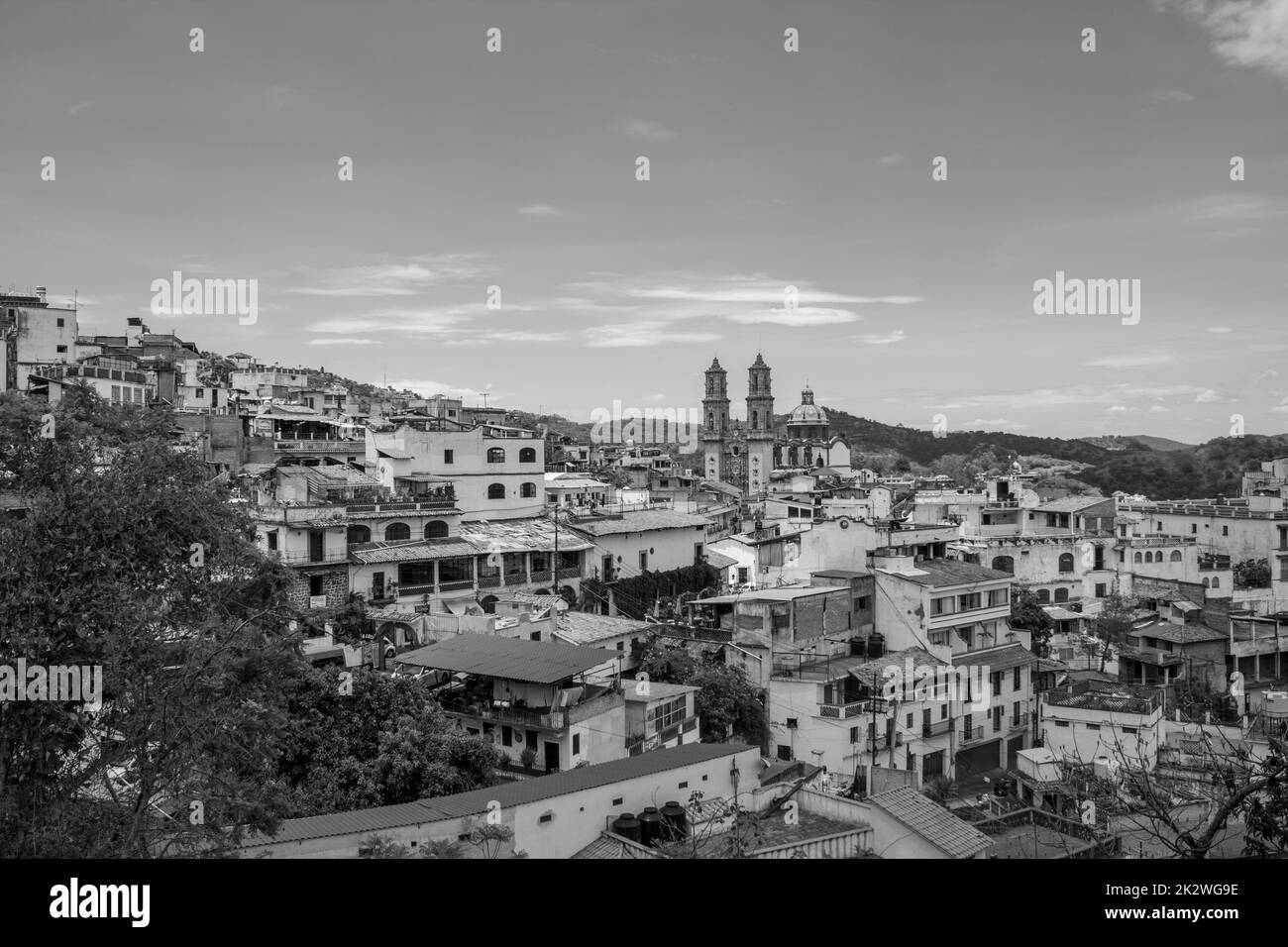 An aerial grayscale shot of the cityscape of Taxco, Guerrero, Mexico ...