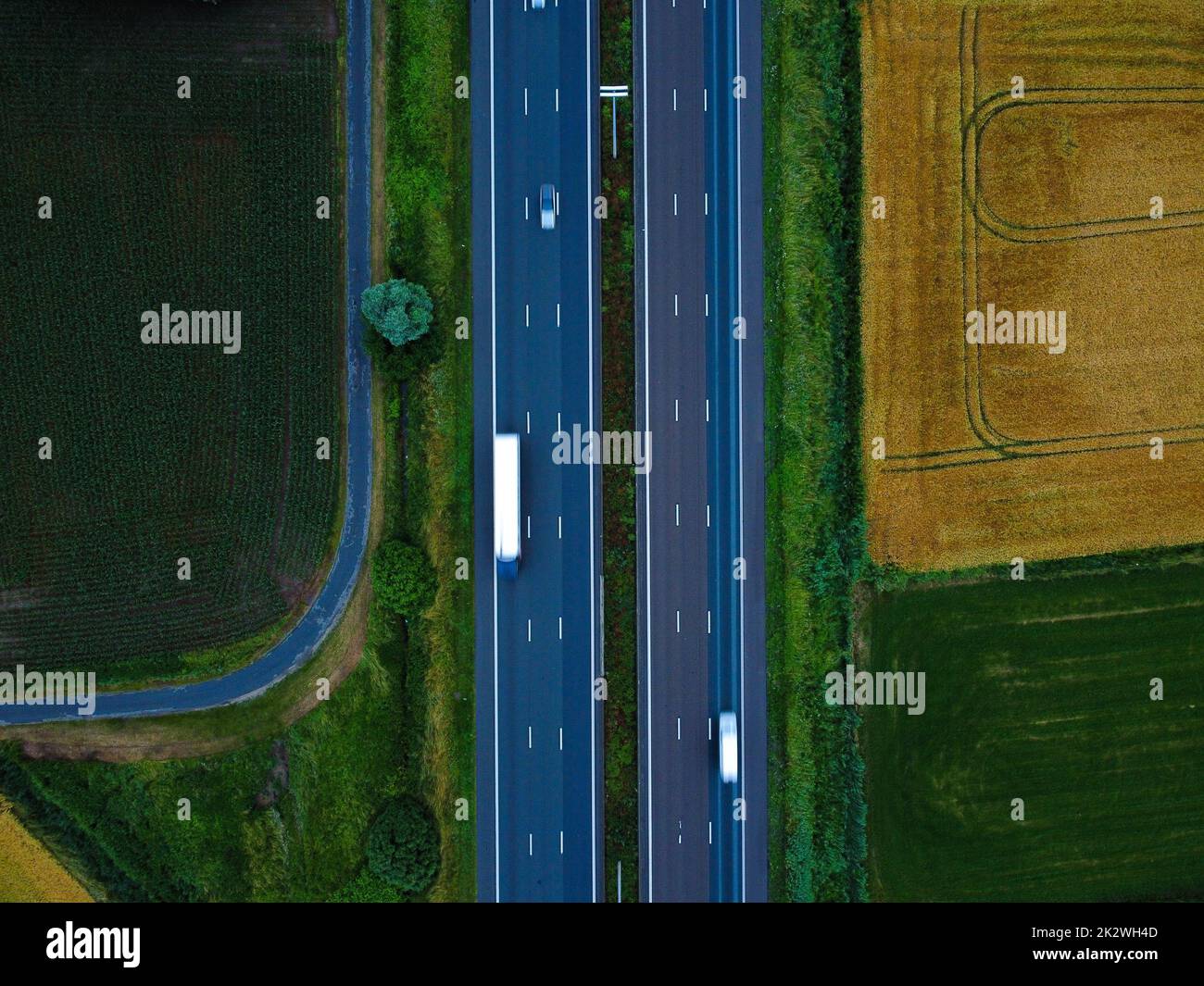 An aerial view of double-way road with light traffic Stock Photo - Alamy