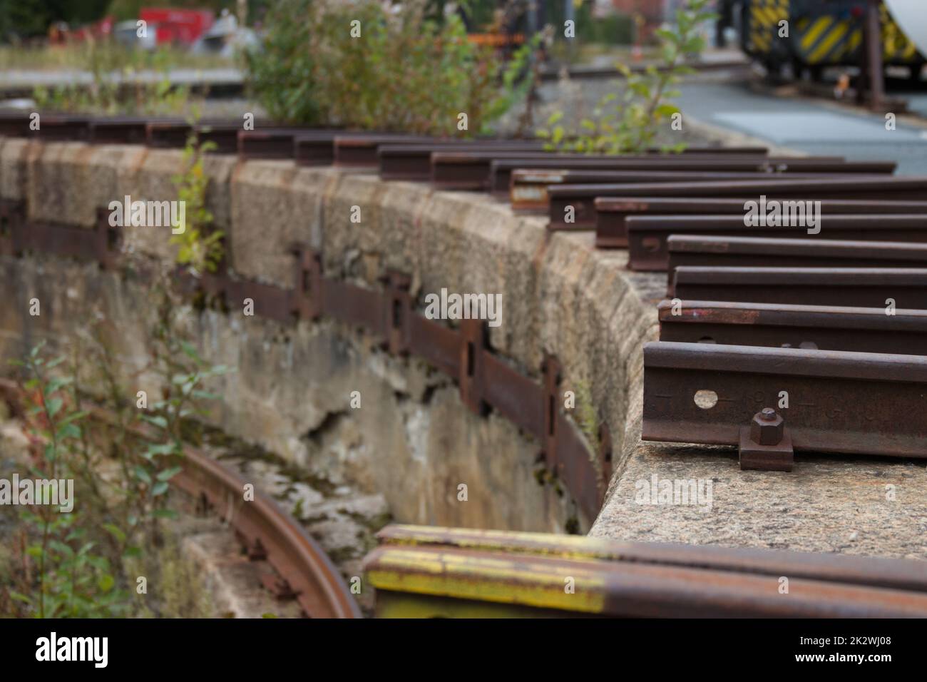 A rounded ledge with rusted steel rails around the perimeter Stock ...
