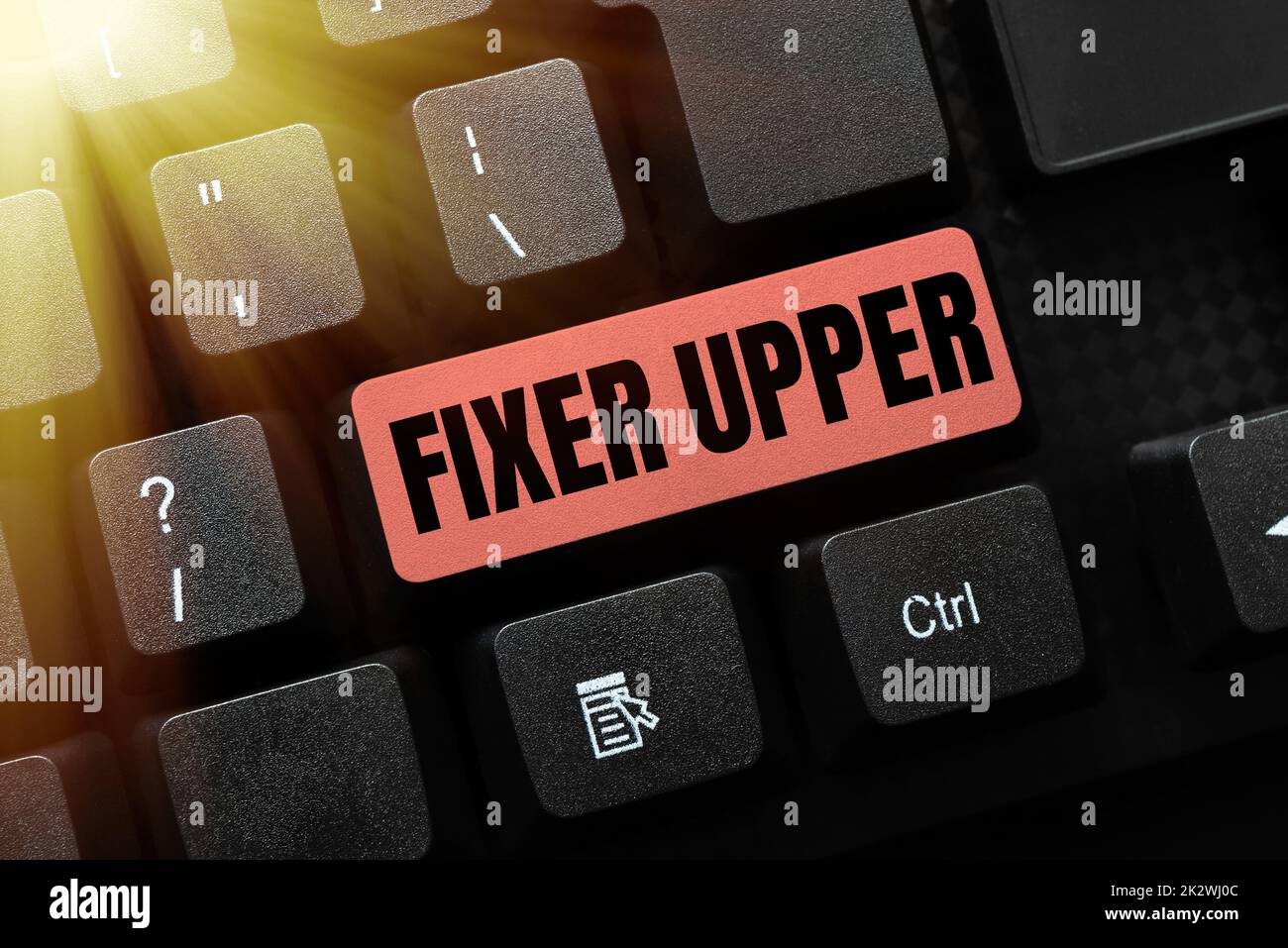 Text sign showing Fixer Upper. Word Written on house in need of repairs ...