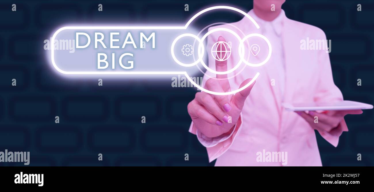 Hand writing sign Dream Big. Business overview To think of something ...