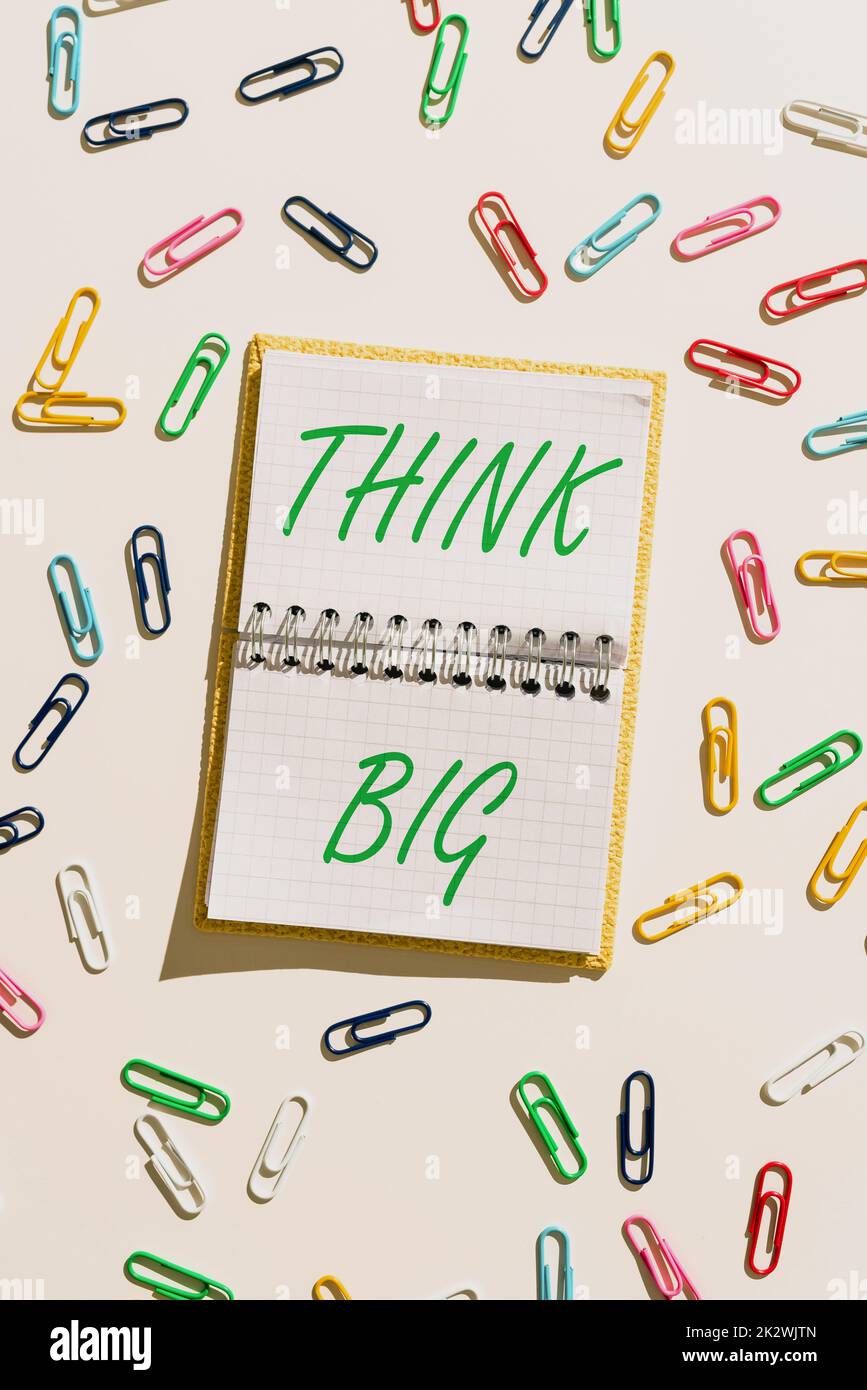 Sign displaying Think Big. Word Written on To plan for something high ...