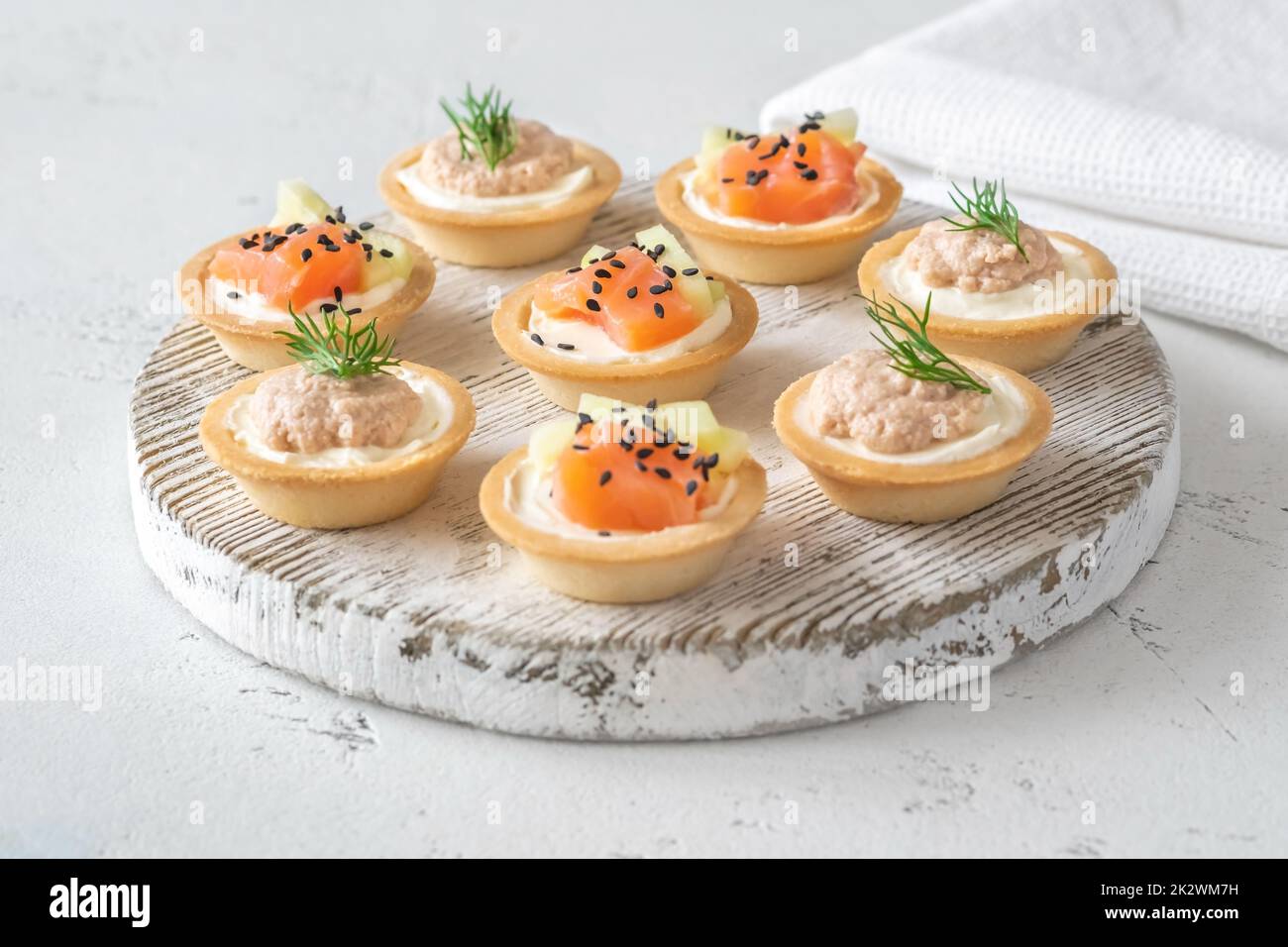 Canapes with cream cheese, cod roe and salmon Stock Photo - Alamy