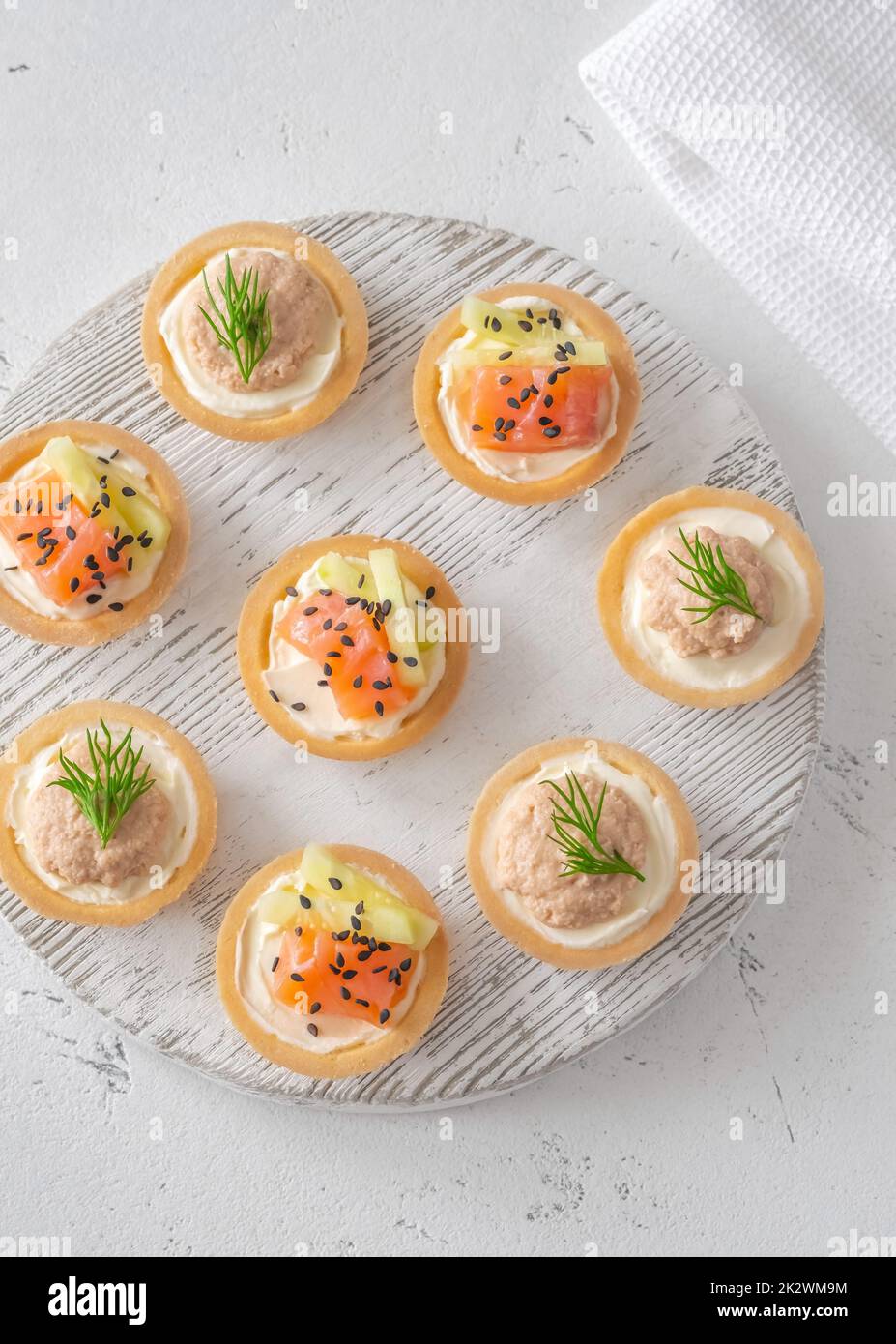 Canapes with cream cheese, cod roe and salmon Stock Photo - Alamy