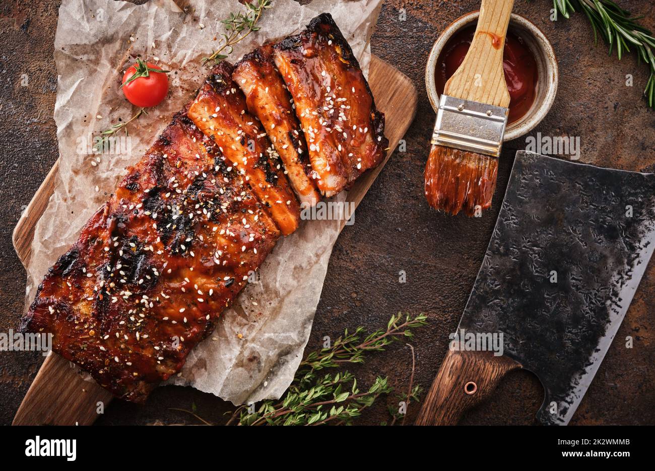 Delicious barbecued ribs seasoned with a spicy basting sauce and served ...