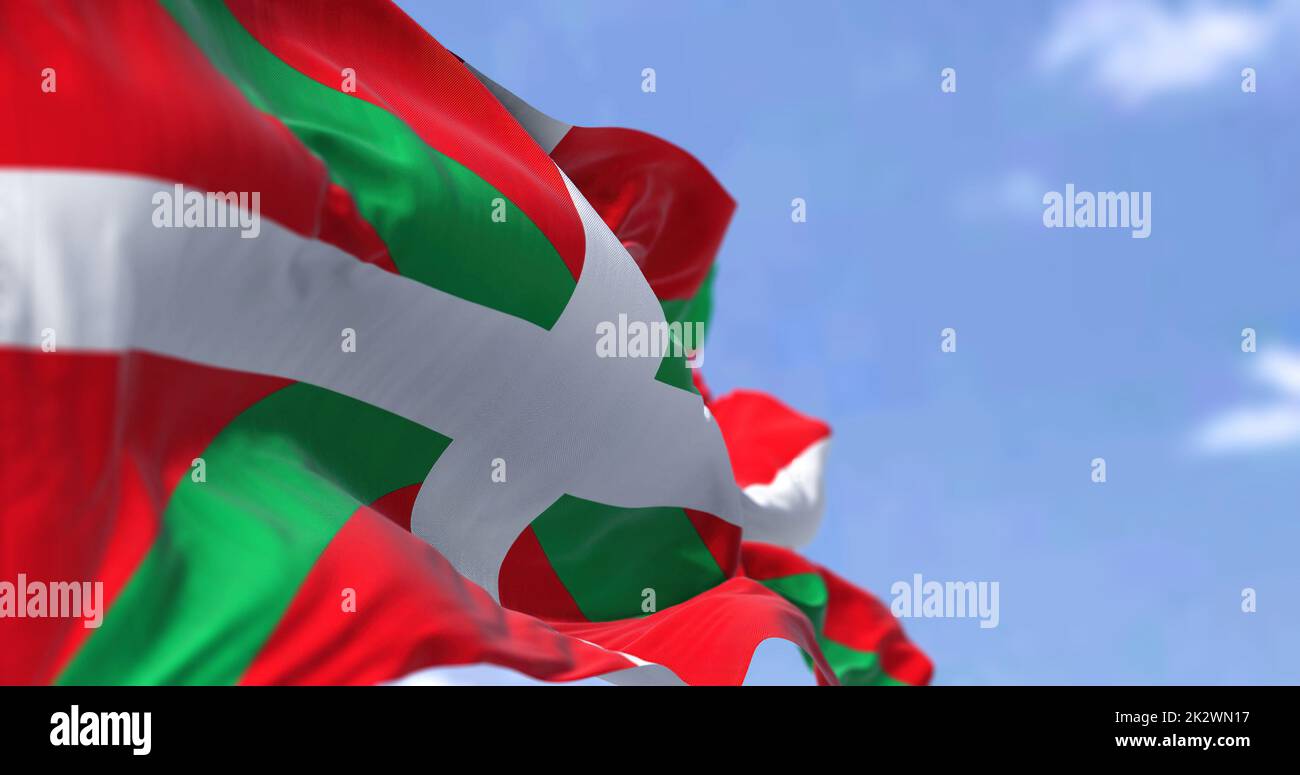 The Basque Country flag waving in the wind on a clear day Stock Photo ...