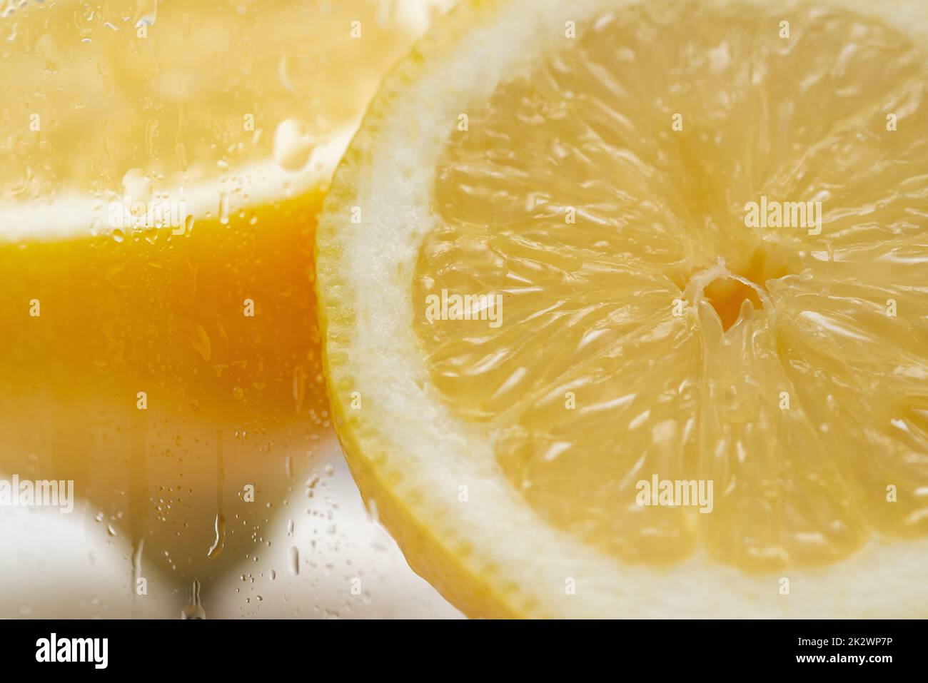 Lemon behind fogged glass Stock Photo - Alamy
