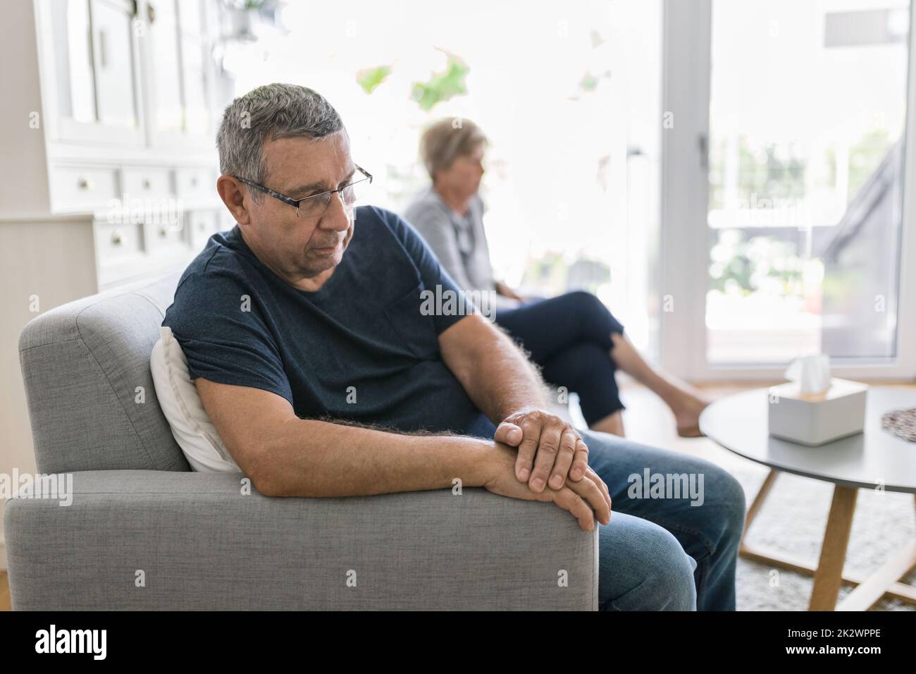 Upset senior couple at home having an argument Stock Photo - Alamy