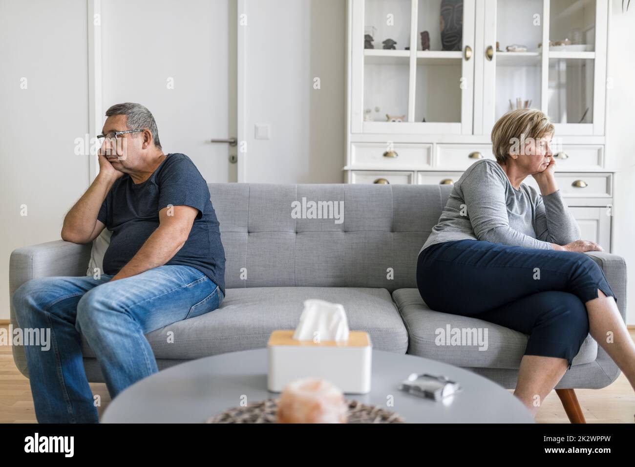 Upset senior couple at home having an argument Stock Photo - Alamy