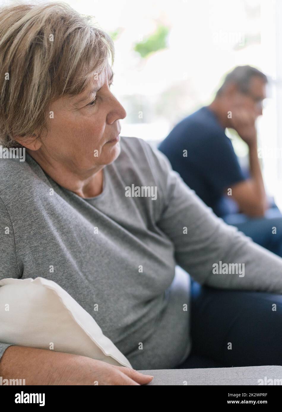 Upset senior couple at home having an argument Stock Photo - Alamy