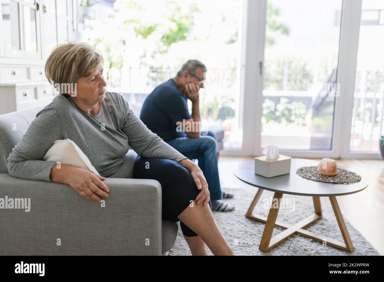 Upset senior couple at home having an argument Stock Photo - Alamy