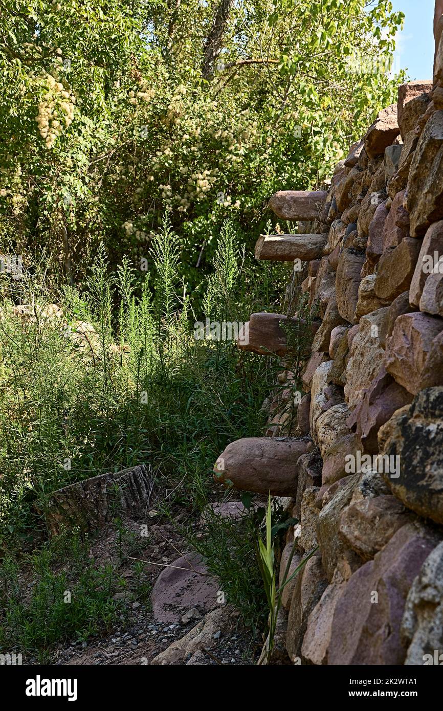 Stone wall for the fields with stone steps to climb Stock Photo - Alamy