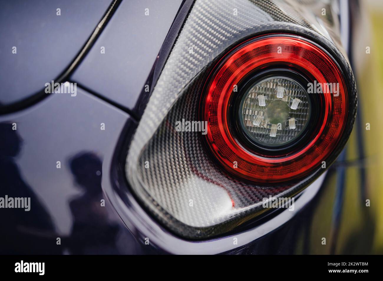 Modern sports car rear stop lights Stock Photo - Alamy