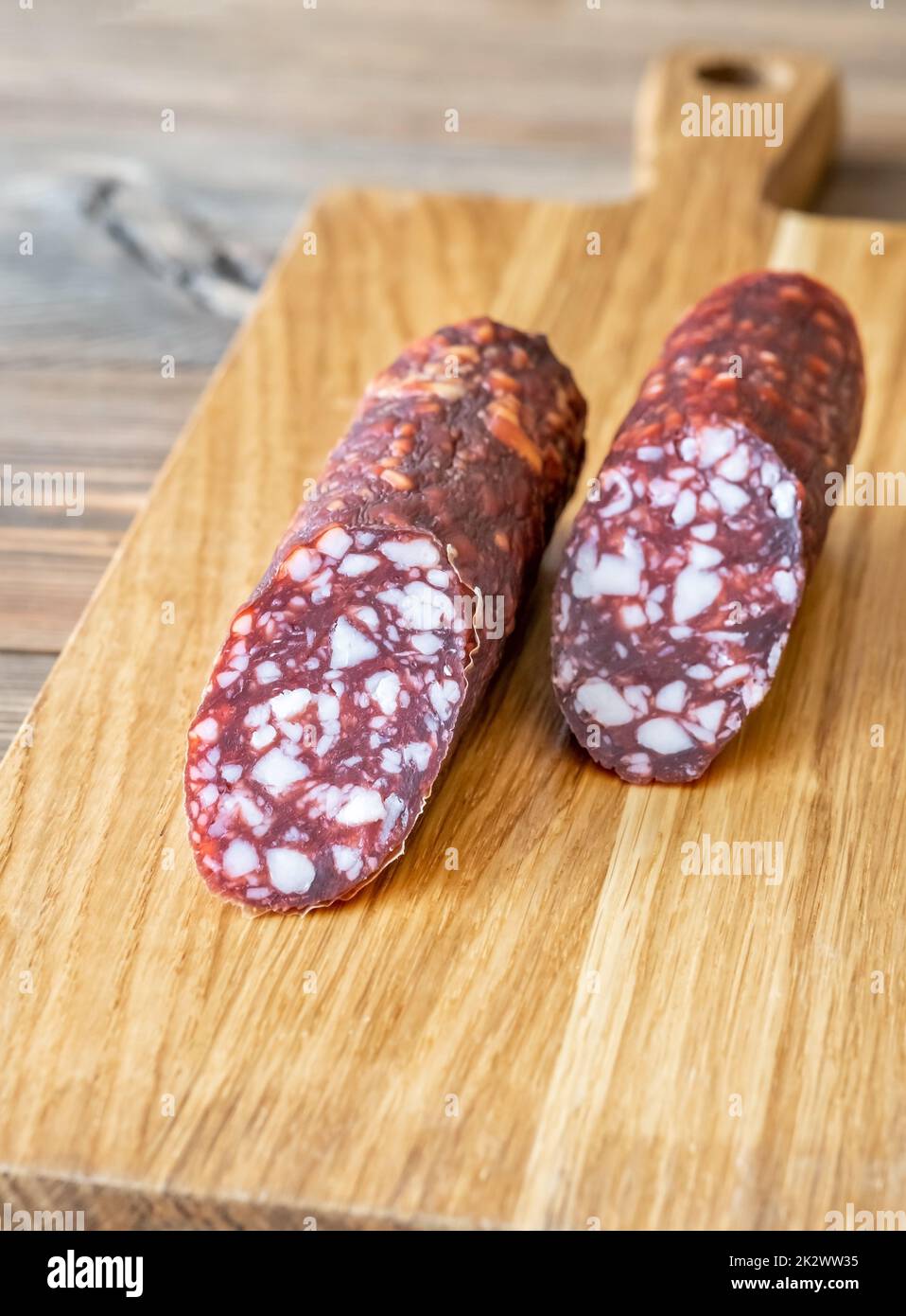 Braunschweiger sausage on the wodden cutting board Stock Photo - Alamy