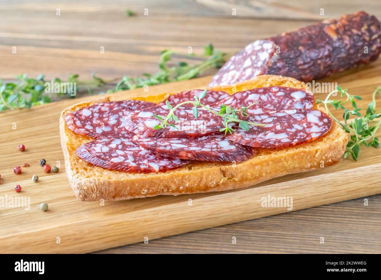 Sandwich wit Braunschweiger sausage on the wodden cutting board Stock ...