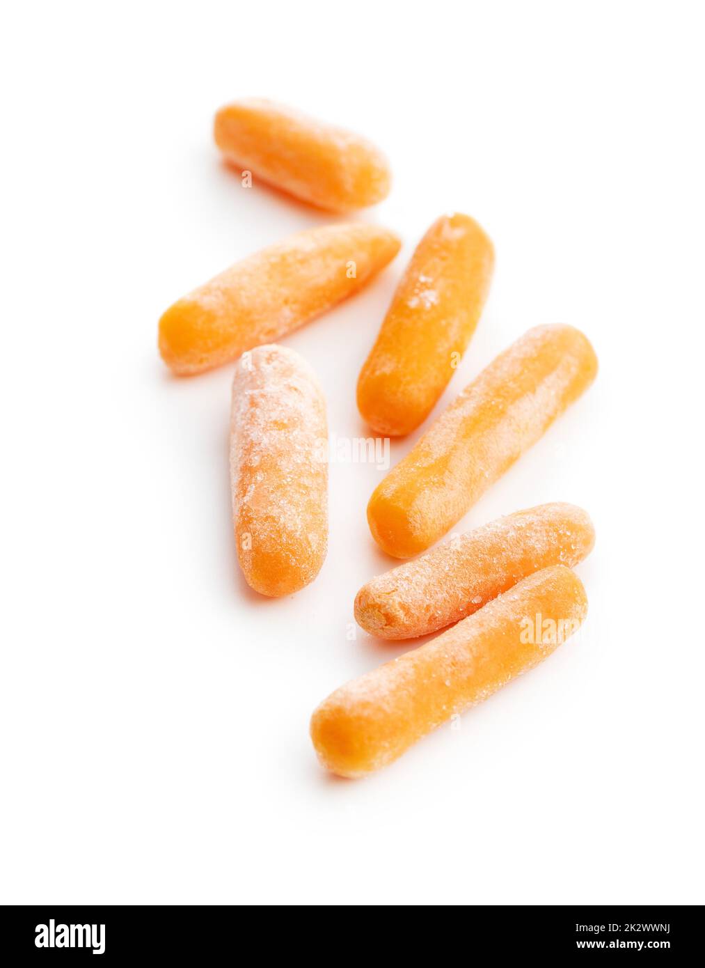 Frozen baby carrot vegetable. Mini orange carrots isolated on white ...