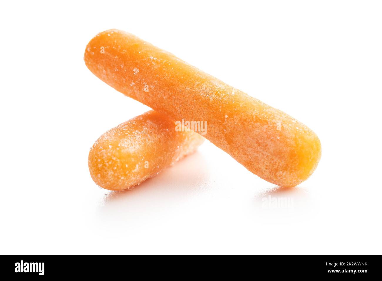 Frozen baby carrot vegetable. Mini orange carrots isolated on white ...