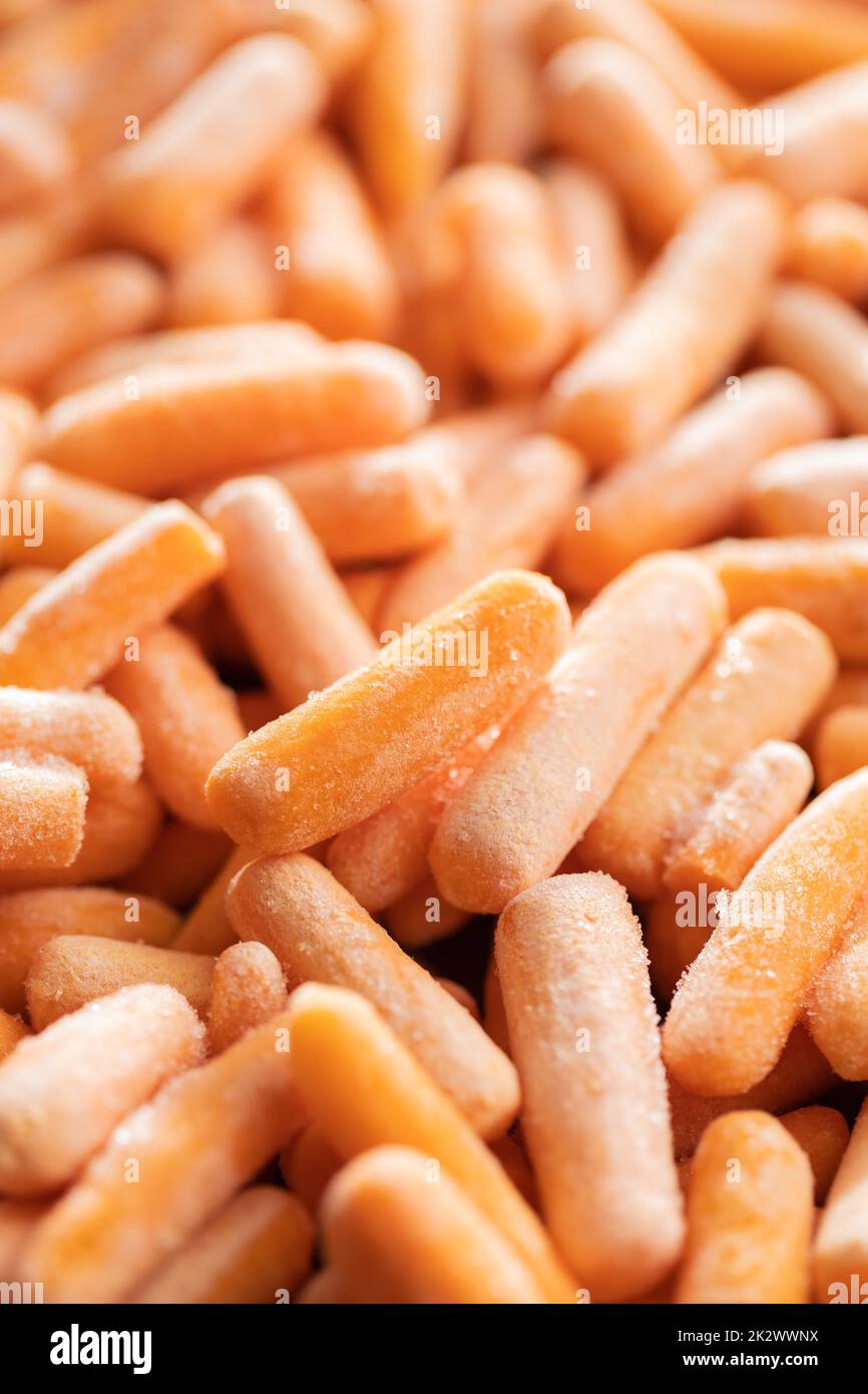 Frozen baby carrot vegetable. Mini orange carrots Stock Photo - Alamy