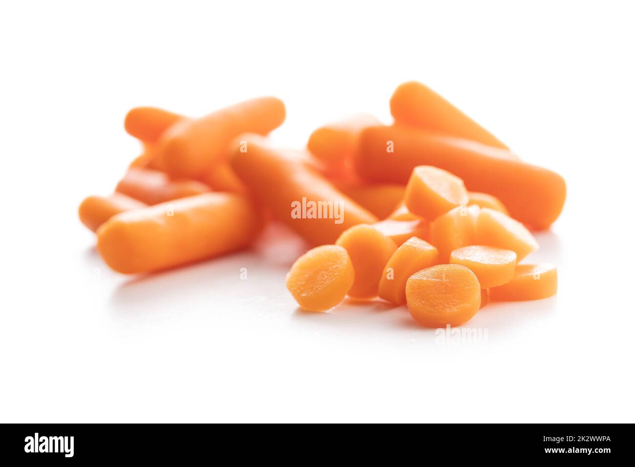 Baby carrot vegetable. Mini orange carrots isolated on white background ...