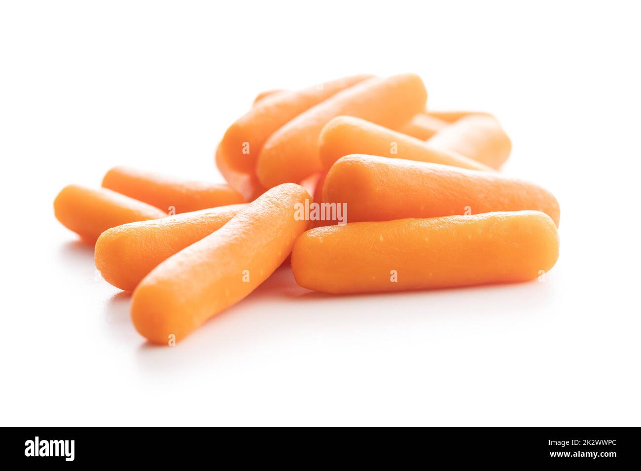 Baby carrot vegetable. Mini orange carrots isolated on white background ...