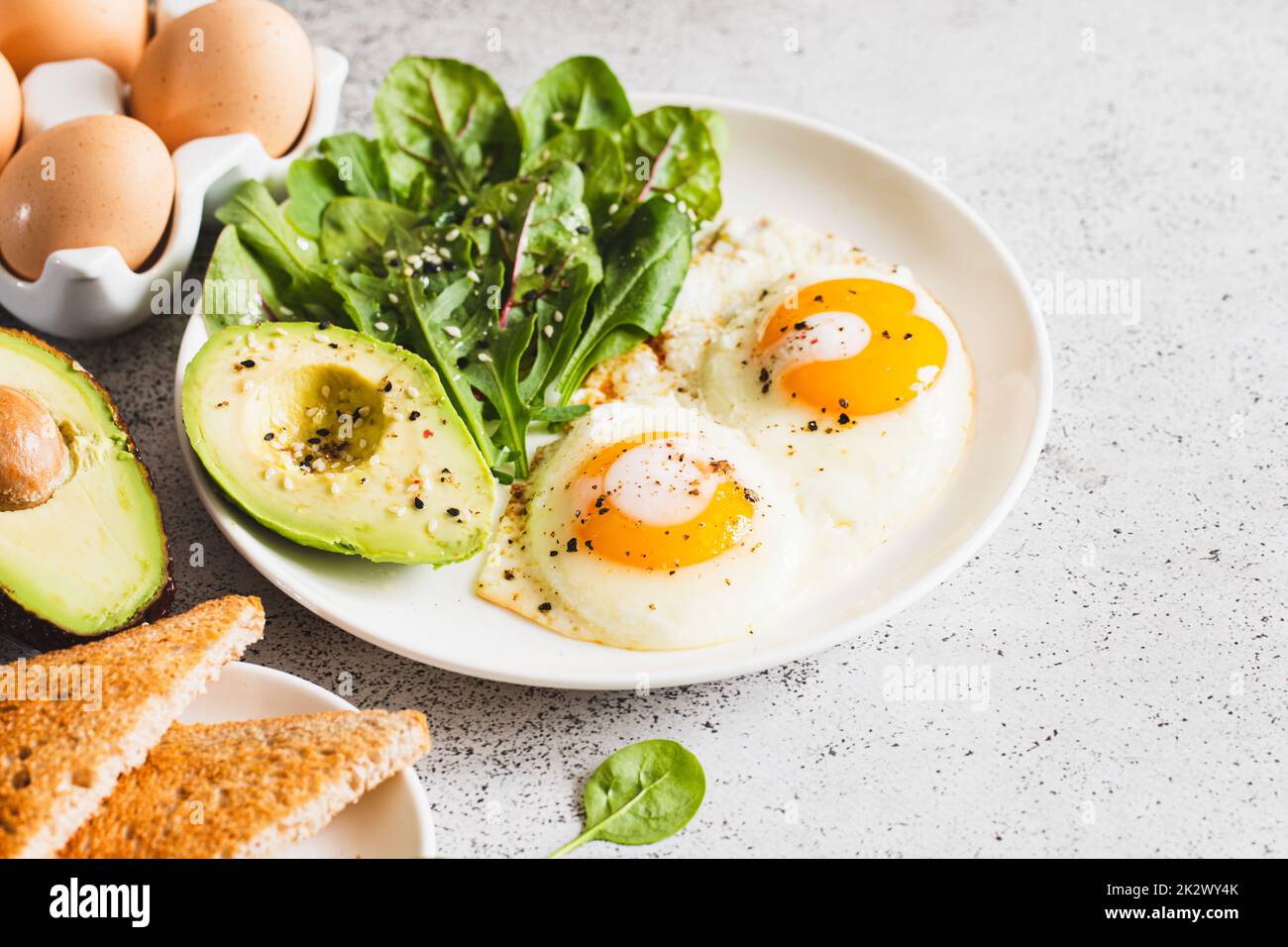 Healthy Breakfast with Wholemeal Bread Toast, Eggs with Green Salad ...