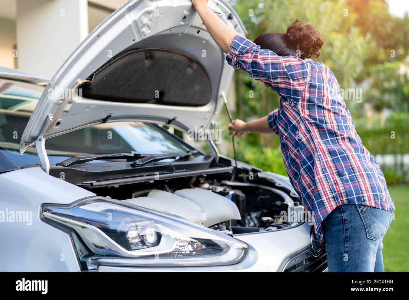 Open hood mechanic engine system to check and repair damage car crash ...