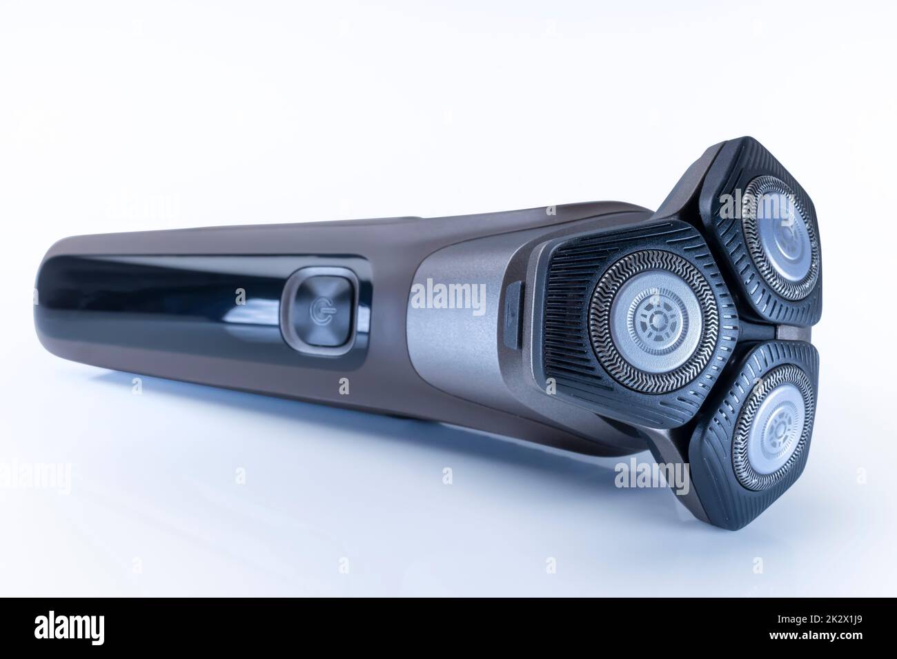 Electric shaver closeup on white background Stock Photo - Alamy