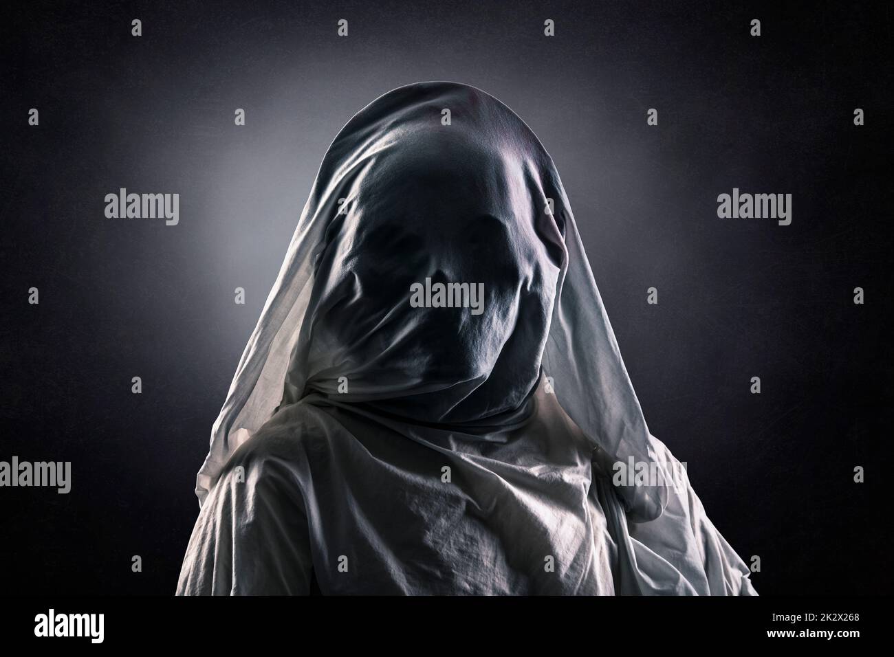 Portrait of a scary ghost over dark misty background Stock Photo - Alamy